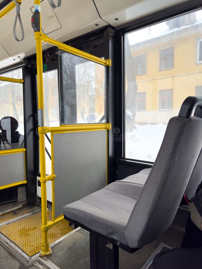 Doors and seats on the bus stock photo. Image of cabin - 308762276