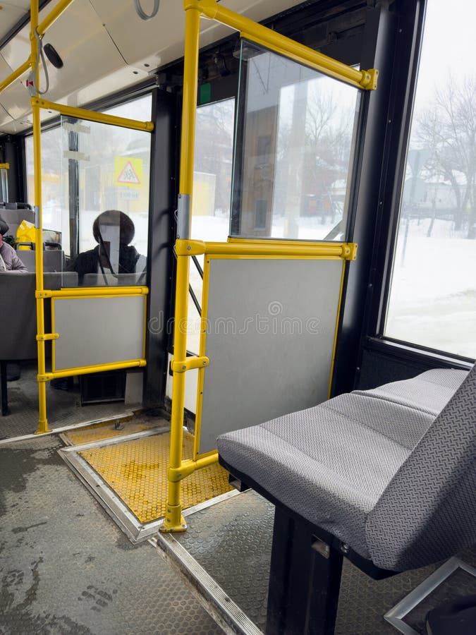 Doors and seats on the bus stock photo. Image of passengers - 309304744