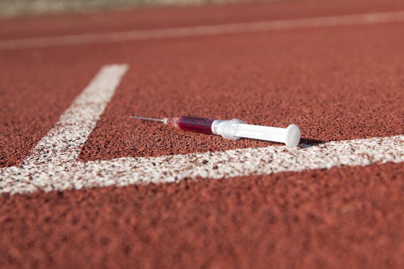 Doping Syringe on Athletics Sports Area Stock Image - Image of ground ...