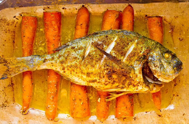 Dorade with Curry on Carrots in Oriental Style Stock Photo - Image of ...