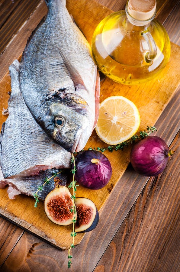 Fish with lemon stock image. Image of market, eating - 34535815