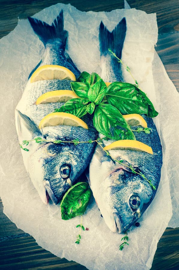 Fish with lemon stock image. Image of market, eating - 34535815