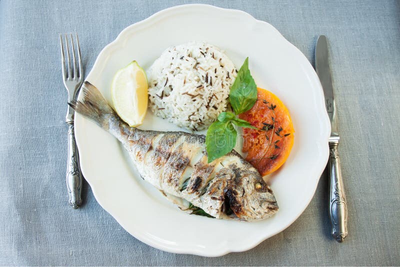 Dorado with Rice and Pumpkin Stock Photo - Image of eating, dish: 72652806