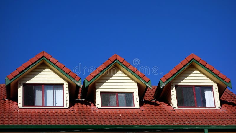 Three Dormer Windows in the Roof of a Tudor Style Black and White ...