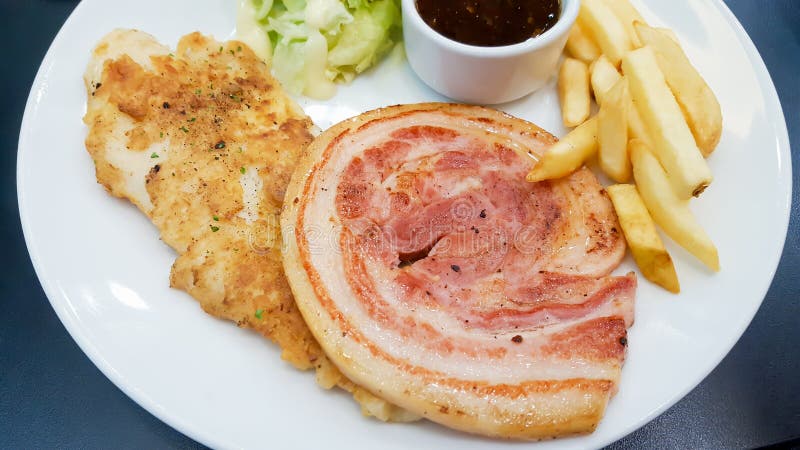 Dory fish and bacon steak stock image. Image of steak - 232467371