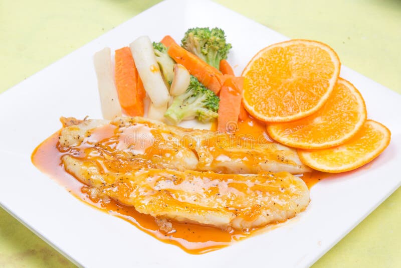 Dory Fish Steak with Orange Sauce Stock Photo - Image of freshness ...