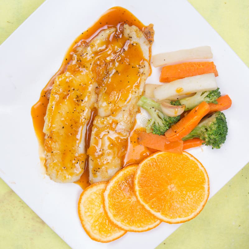Dory Fish Steak with Orange Sauce Stock Photo - Image of carrot, orange ...