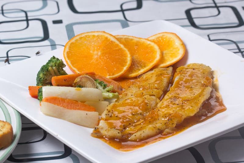 Dory Fish Steak with Orange Sauce Stock Image - Image of carrot, cooked ...
