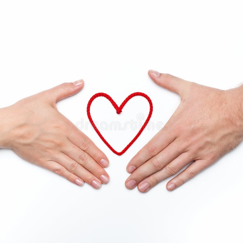 Dos Manos Con Un Corazón Rojo Foto de archivo - Imagen de amor ...