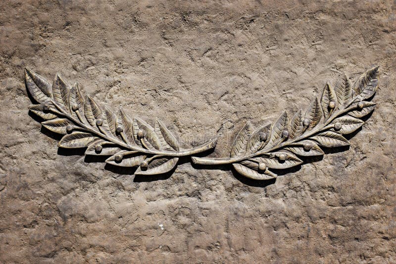Dos Ramas Con Las Hojas Talladas En Piedra Imagen de archivo - Imagen ...