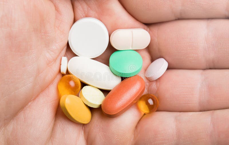 Pills in the hand stock photo. Image of health, medication - 106681054