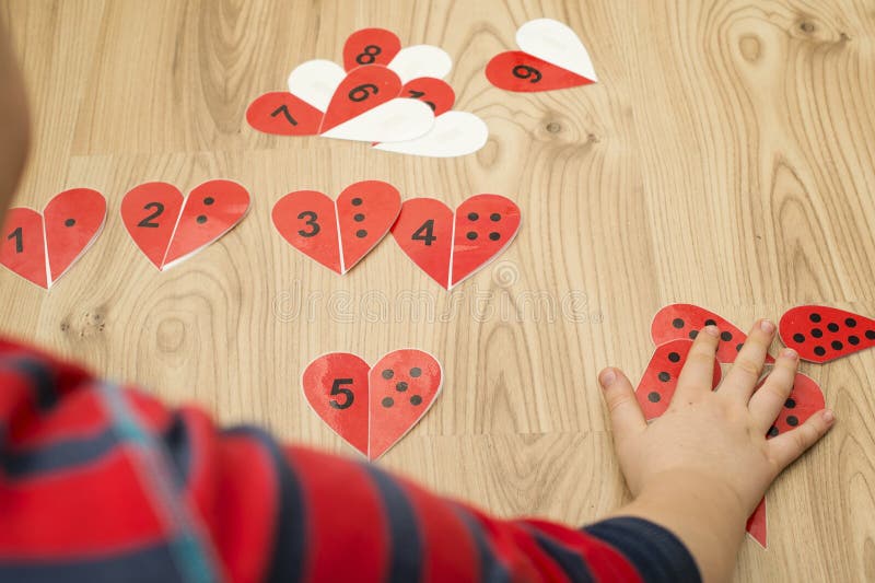 Counting heart shape game. stock photo. Image of children - 239322286