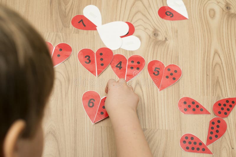 Counting heart shape game. stock photo. Image of business - 239322290