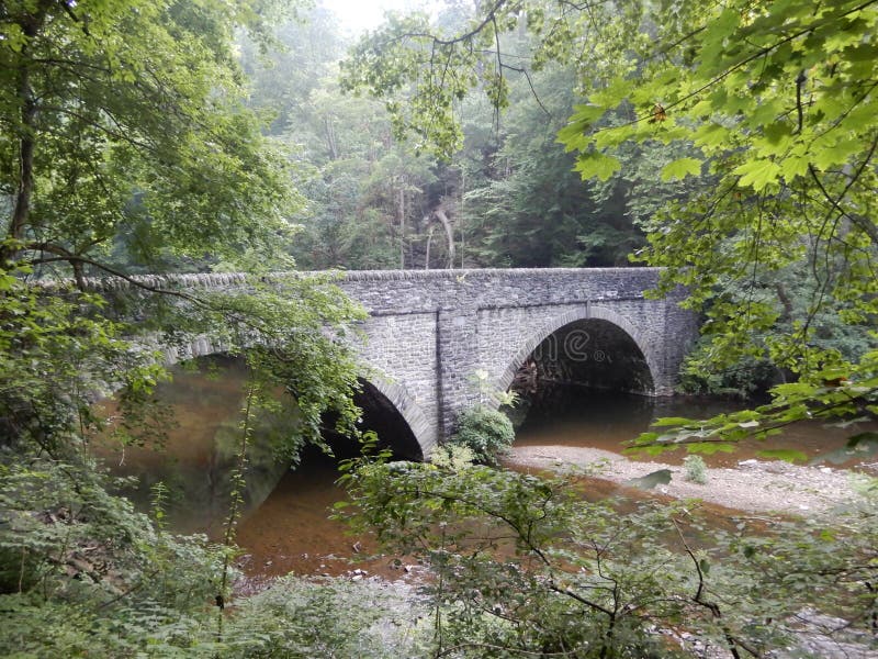 Double Arched Stone Bridge Over Stream from Below Stock Photo - Image ...