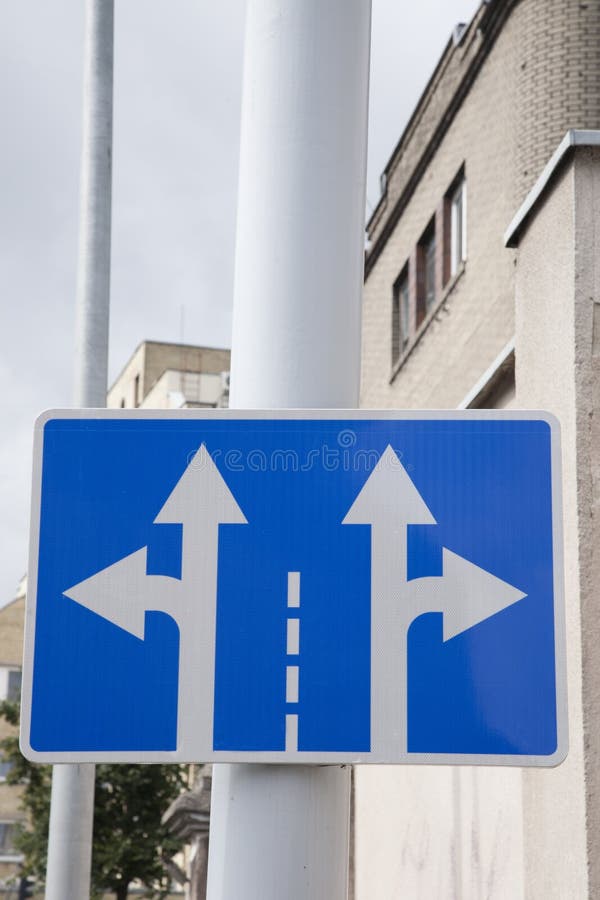 Double Arrow Traffic Sign stock photo. Image of white - 52376842