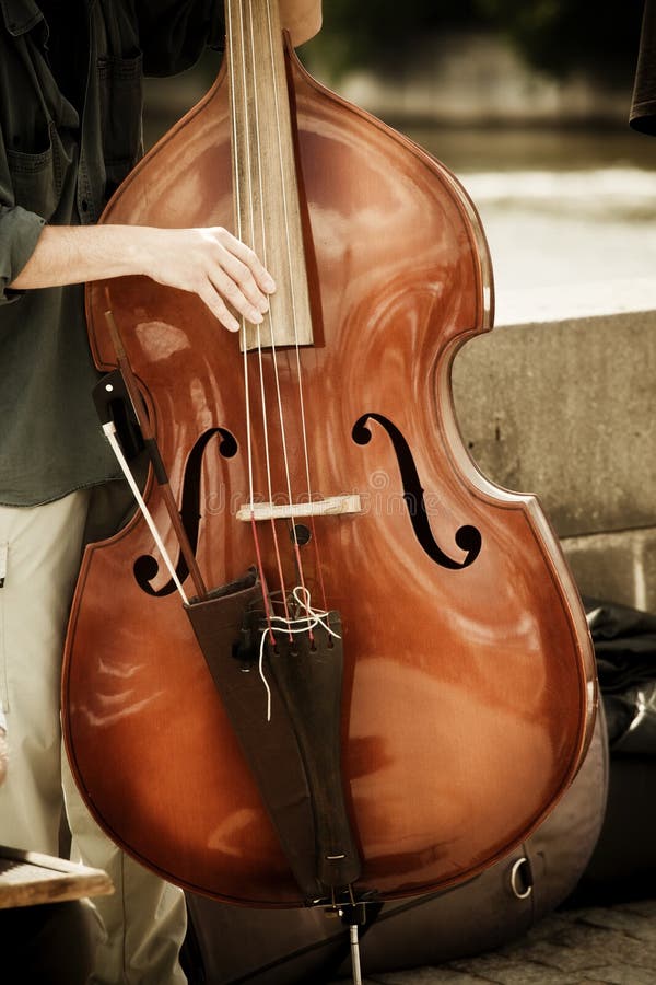 Double bass performer stock image. Image of street, music - 10717893