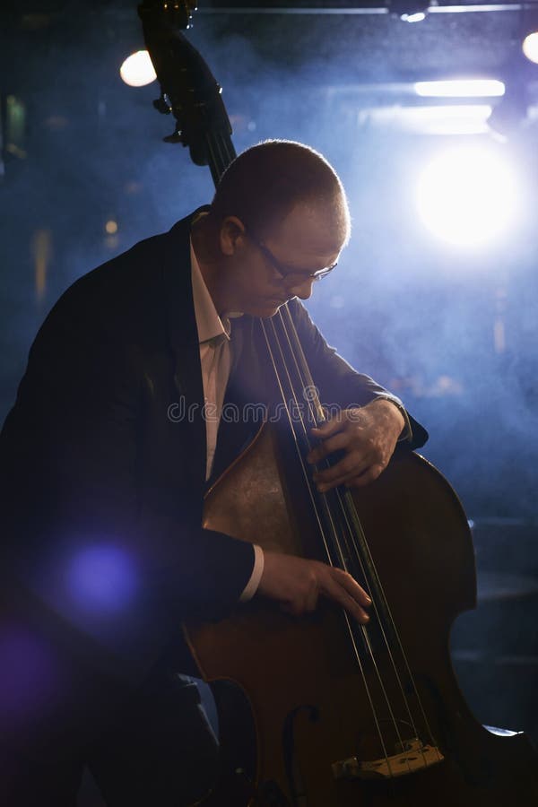 Double Bass Player on Stage Stock Image - Image of ensemble, classical ...