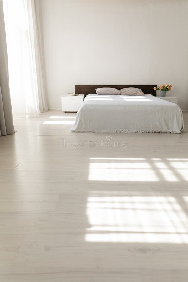Double Bed in a Bright Room in the Bedroom Interior Stock Photo - Image ...