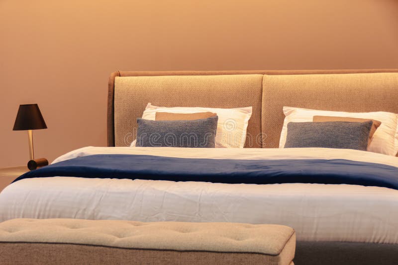 Double Bed in the Corner of the Room Stock Image - Image of cushion ...