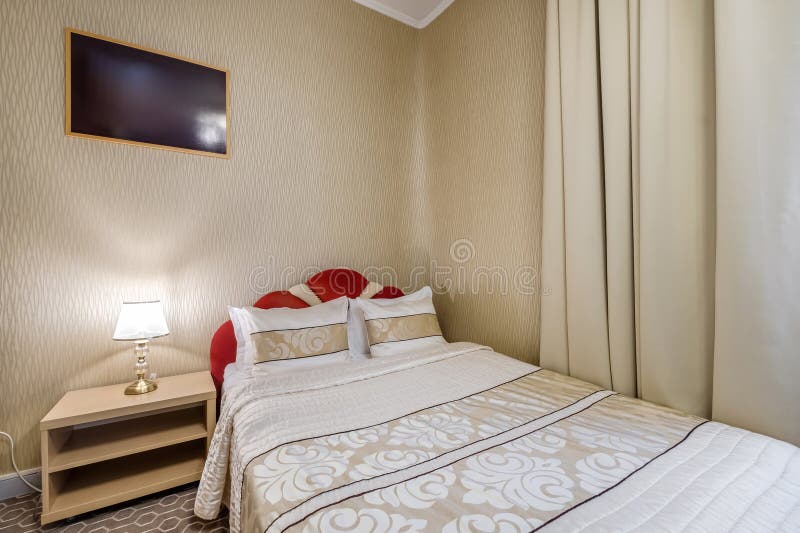 Double Bed with Pillows in Interior with Night Lamp in Hotel Room Stock ...