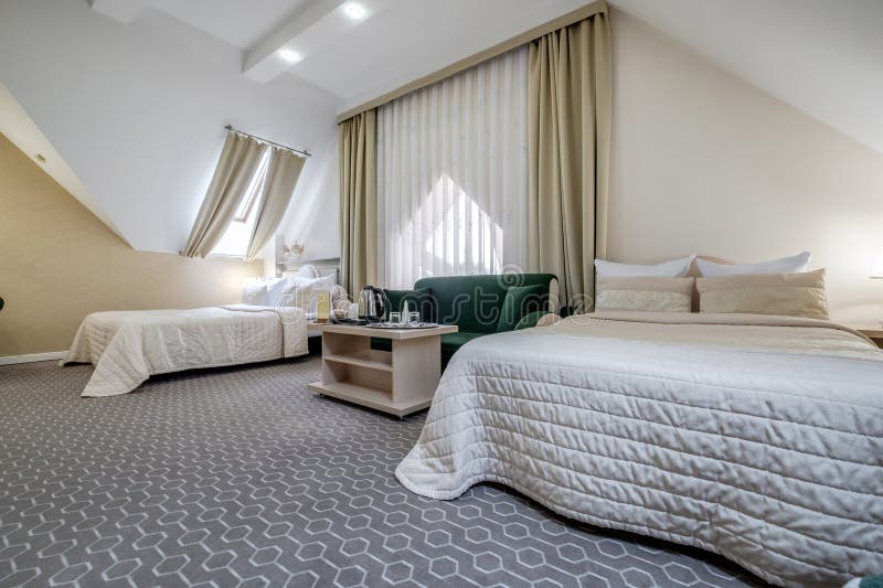 Double Bed with Pillows in Interior with Night Lamp in Hotel Room Stock ...