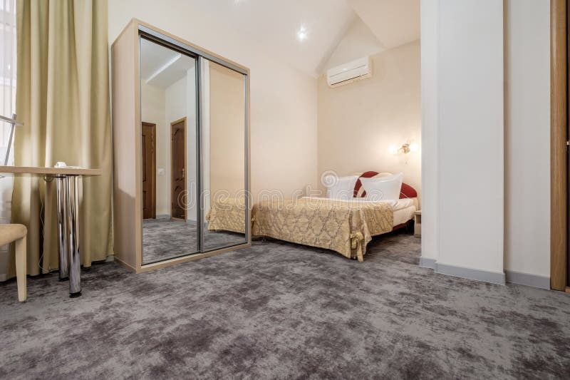 Double Bed with Pillows in Interior with Night Lamp in Hotel Room Stock ...