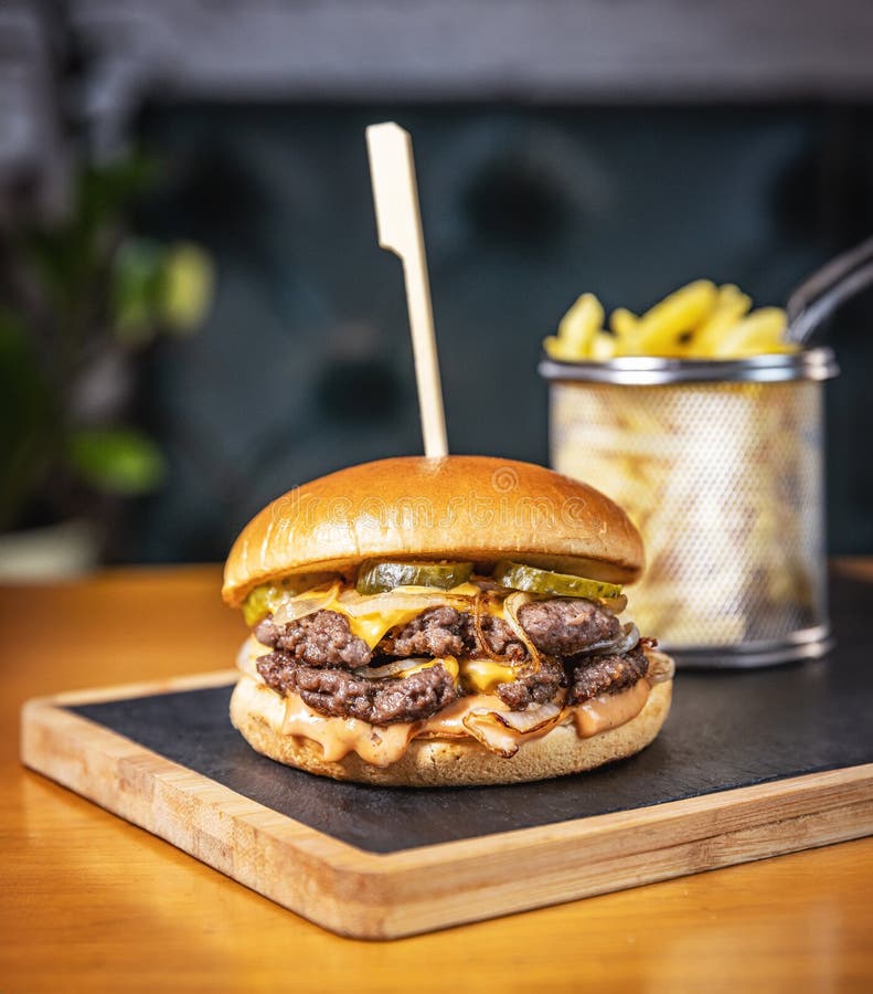 Double beef burger stock image. Image of table, savory - 327383265