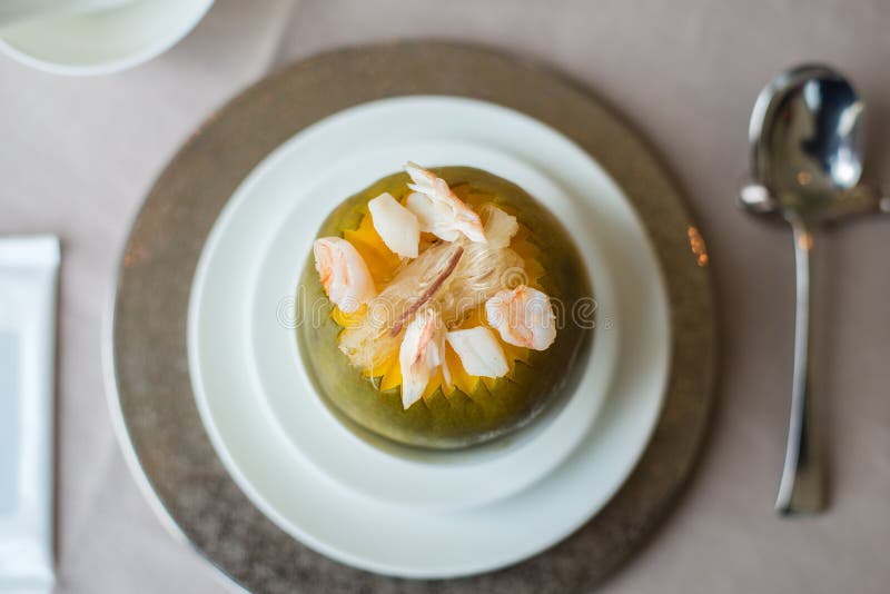 Double Boiled 4 Treasure Soup in Papaya Stock Photo - Image of cuisine ...