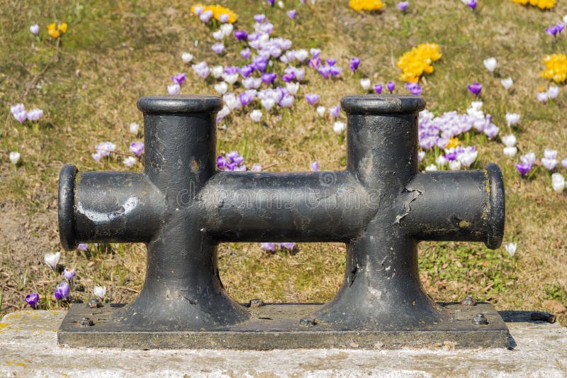 Red Double Bollard on Ship Deck with Rope Tied Around it, Ship Railing ...