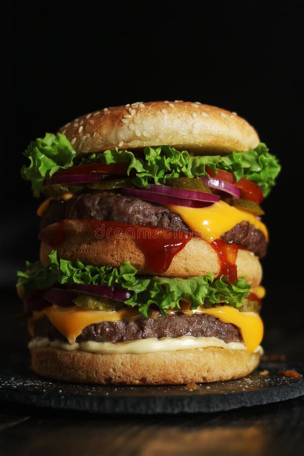 A double burger in low key stock photo. Image of lettuce - 276592802