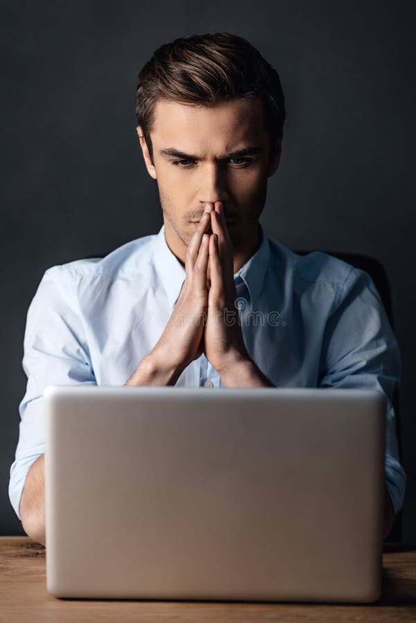 Double-checking his work. stock image. Image of internet - 66398417