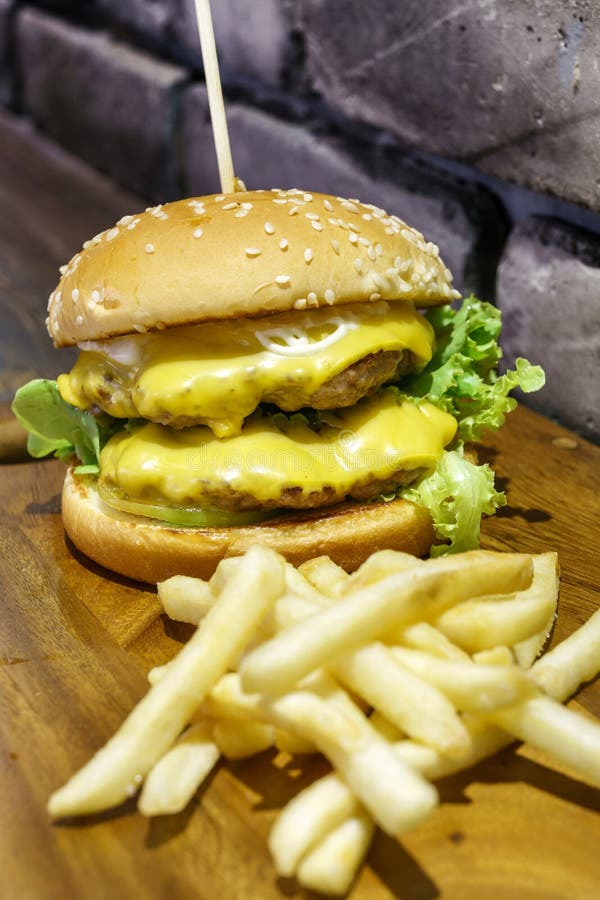 Double cheese burger stock image. Image of cheese, fast - 57978297
