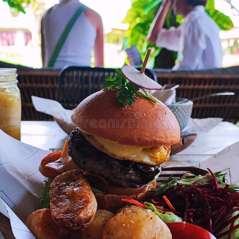 Double Cheese Burger in the Middle of Rice Fields Stock Photo - Image ...