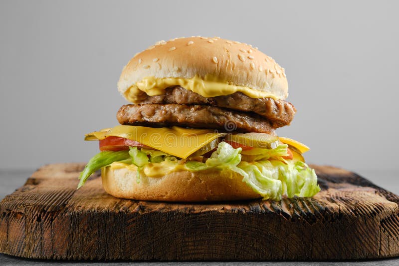 Double Cheeseburger with Cheese Sauce, Front View Stock Image - Image ...