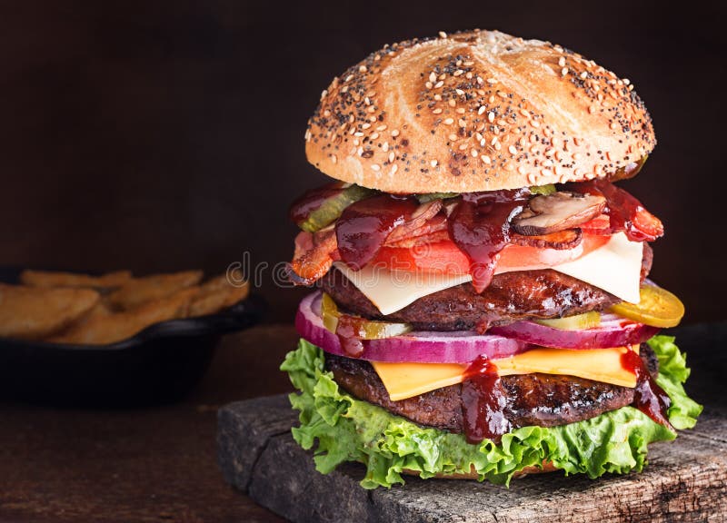 Double cheeseburger deluxe stock image. Image of mushroom - 50618341