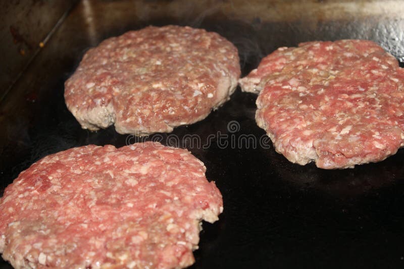 Double Cheeseburger and Smiley Chips Stock Image - Image of meal ...