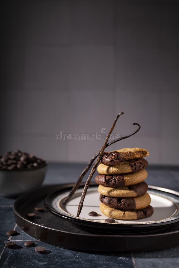 Double Chocolate and Vanilla Cookies on a Playful Stack Stock Image ...