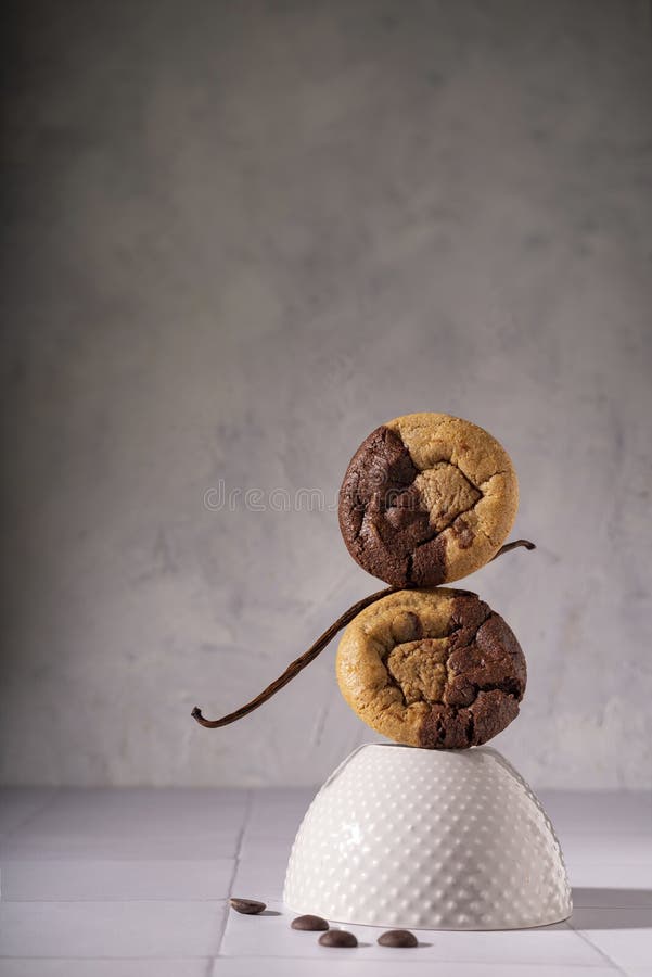 Double Chocolate and Vanilla Cookies on a Playful Stack Stock Image ...