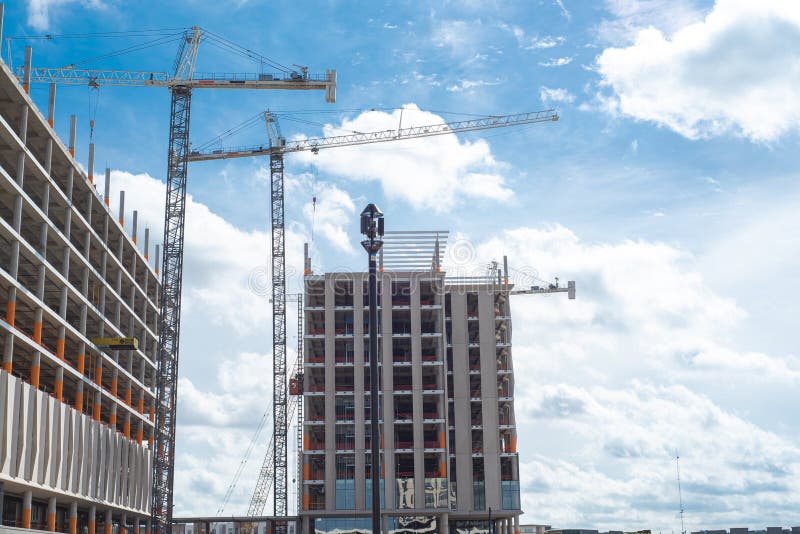 Double Cranes Working Concrete Building Construction Site, High-rise ...