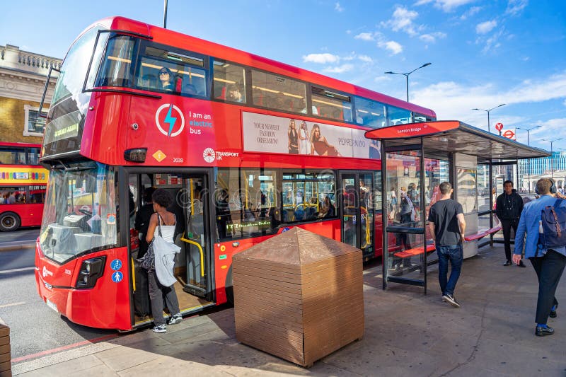 Double Decker Bus Approaching London Bridge Stop To Drop Off and Pick ...