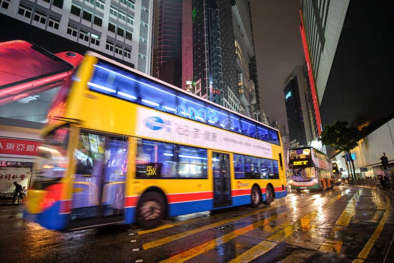 Double Decker Buses Drive on the Road of Causeway Bay on a Rainy ...