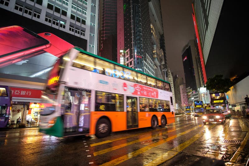 Double Decker Buses Drive on the Road of Causeway Bay on a Rainy ...
