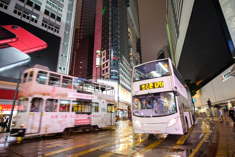 Double Decker Buses Drive on the Road of Causeway Bay on a Rainy ...