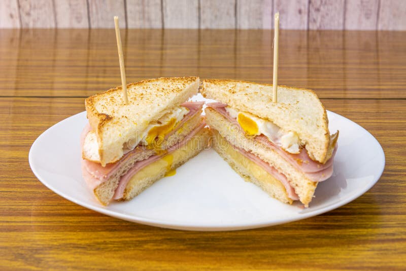 Double-decker Sandwich for Breakfast or a Snack with a Fried Egg ...