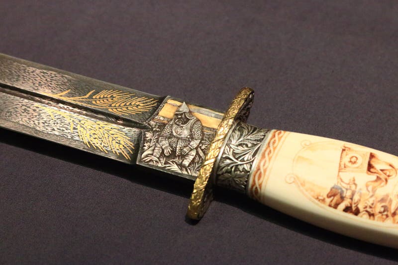 `of Mighty Deeds, of Noble Feats, of Glory` Dagger. Close-up View ...