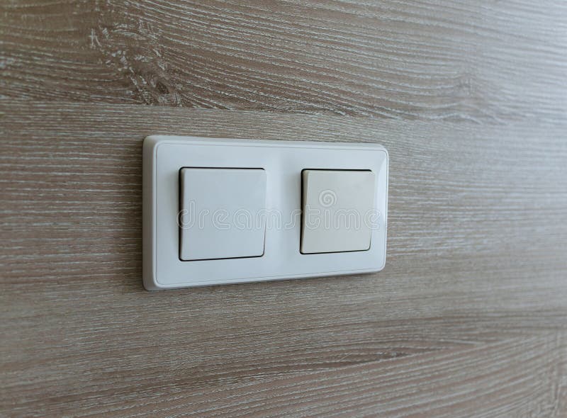 Double Electric Light Switch on a Wooden Panel Close-up Stock Photo ...