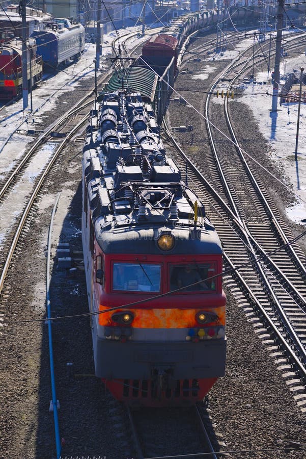 A Double Electric Locomotive Pulls a Long Freight Train. Top and Front ...