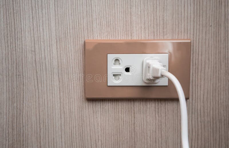 Double Electrical Power Socket and Single Plug Switched on Wood Stock ...