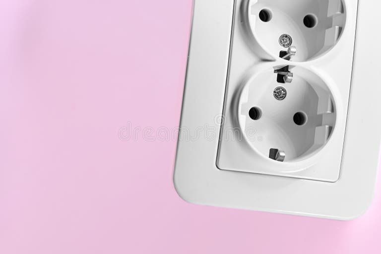 Double Electrical Socket for Connecting Devices on Pink Stock Image ...