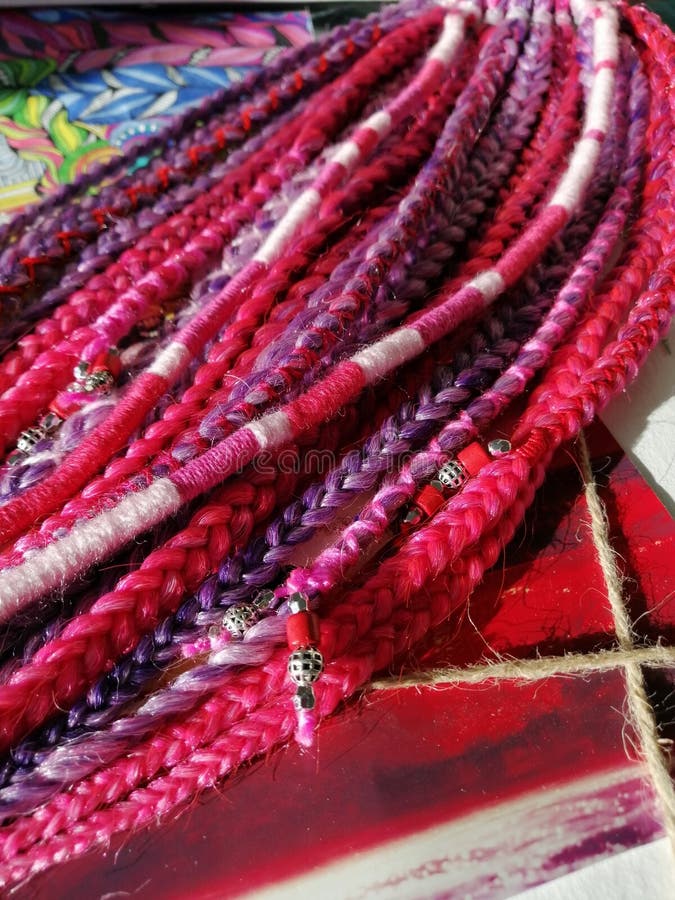 Double Ended Synthetic Braids and Dreadlocks Pink Stock Image - Image ...